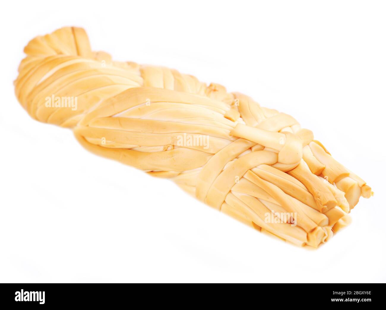 Smoked braided cheese isolated on white Stock Photo - Alamy