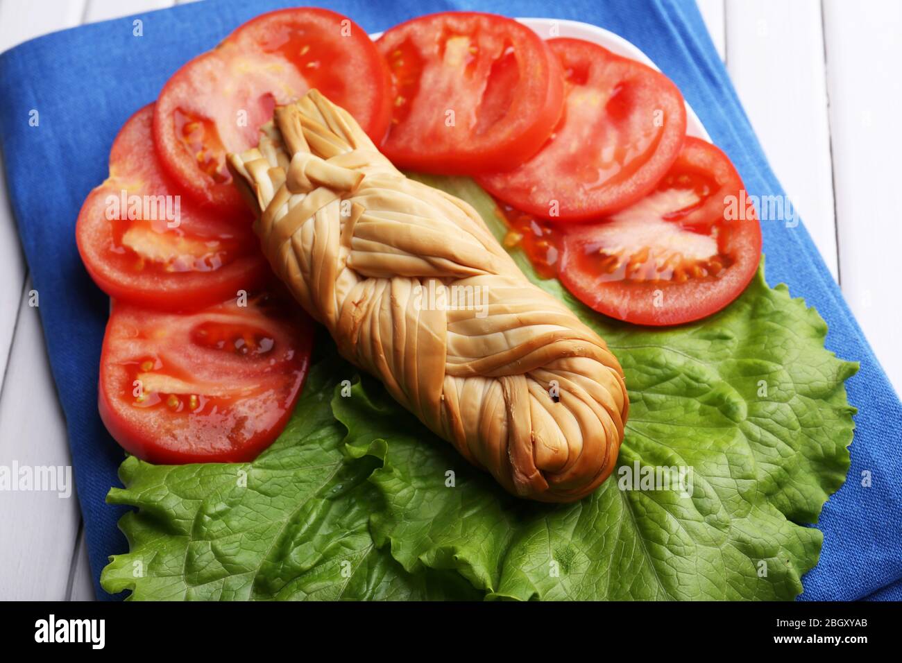 Smoked braided cheese close-up Stock Photo - Alamy