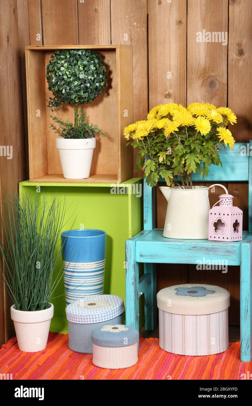 Beautiful colorful shelves with different home related objects on ...