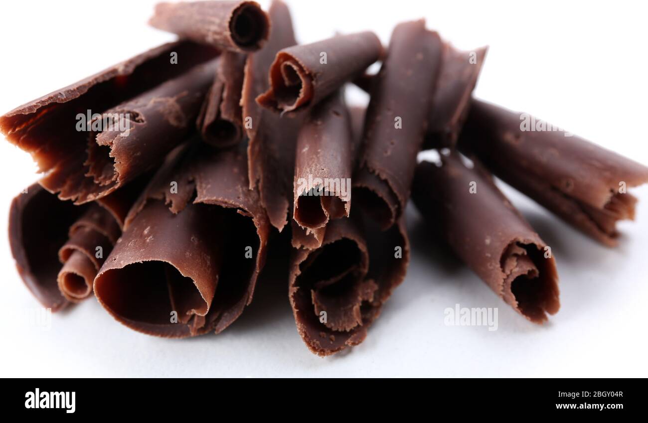 Chocolate curls isolated on white Stock Photo - Alamy