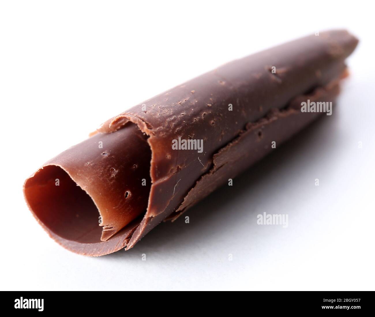 Chocolate curls isolated on white Stock Photo - Alamy