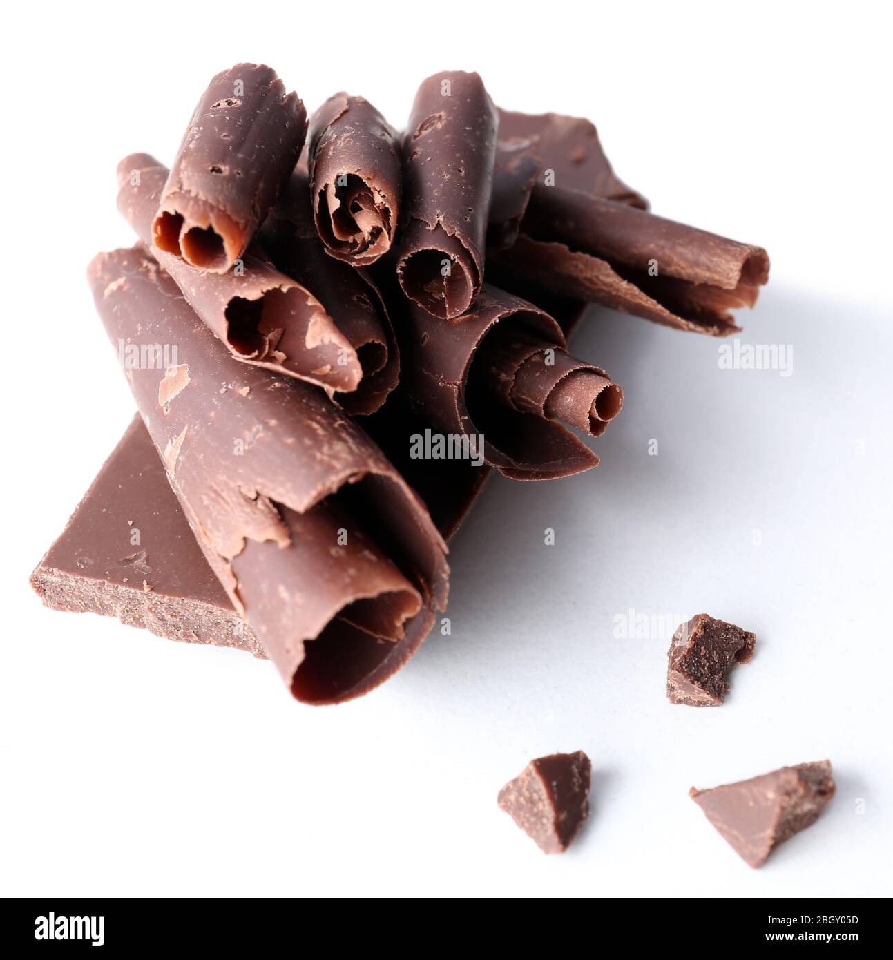 Chocolate curls isolated on white Stock Photo - Alamy