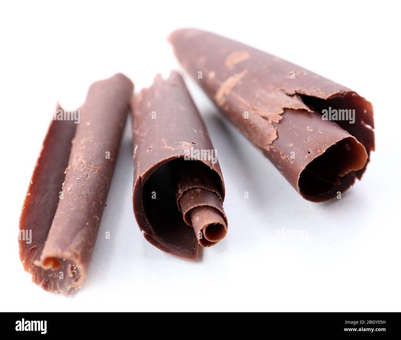 Chocolate curls isolated on white Stock Photo - Alamy