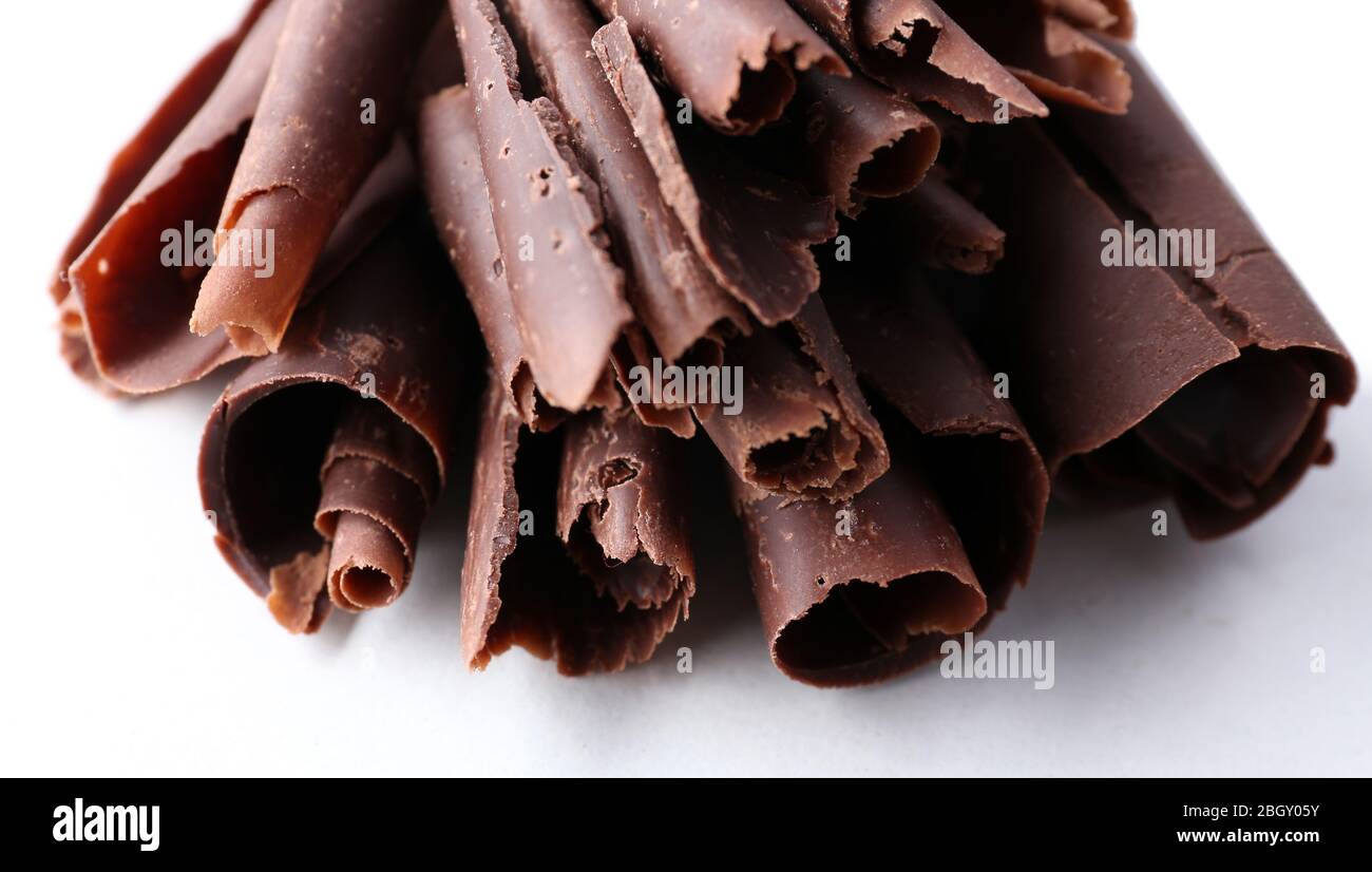 Chocolate curls isolated on white Stock Photo - Alamy
