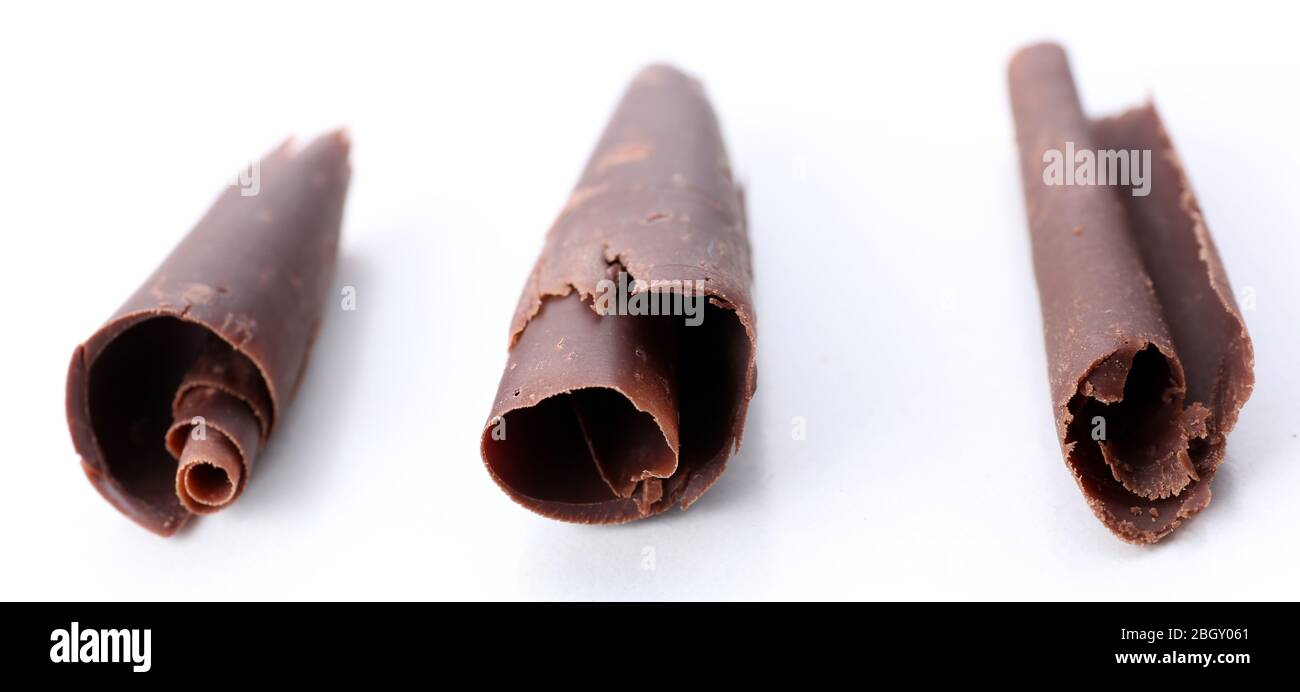 Chocolate curls isolated on white Stock Photo - Alamy
