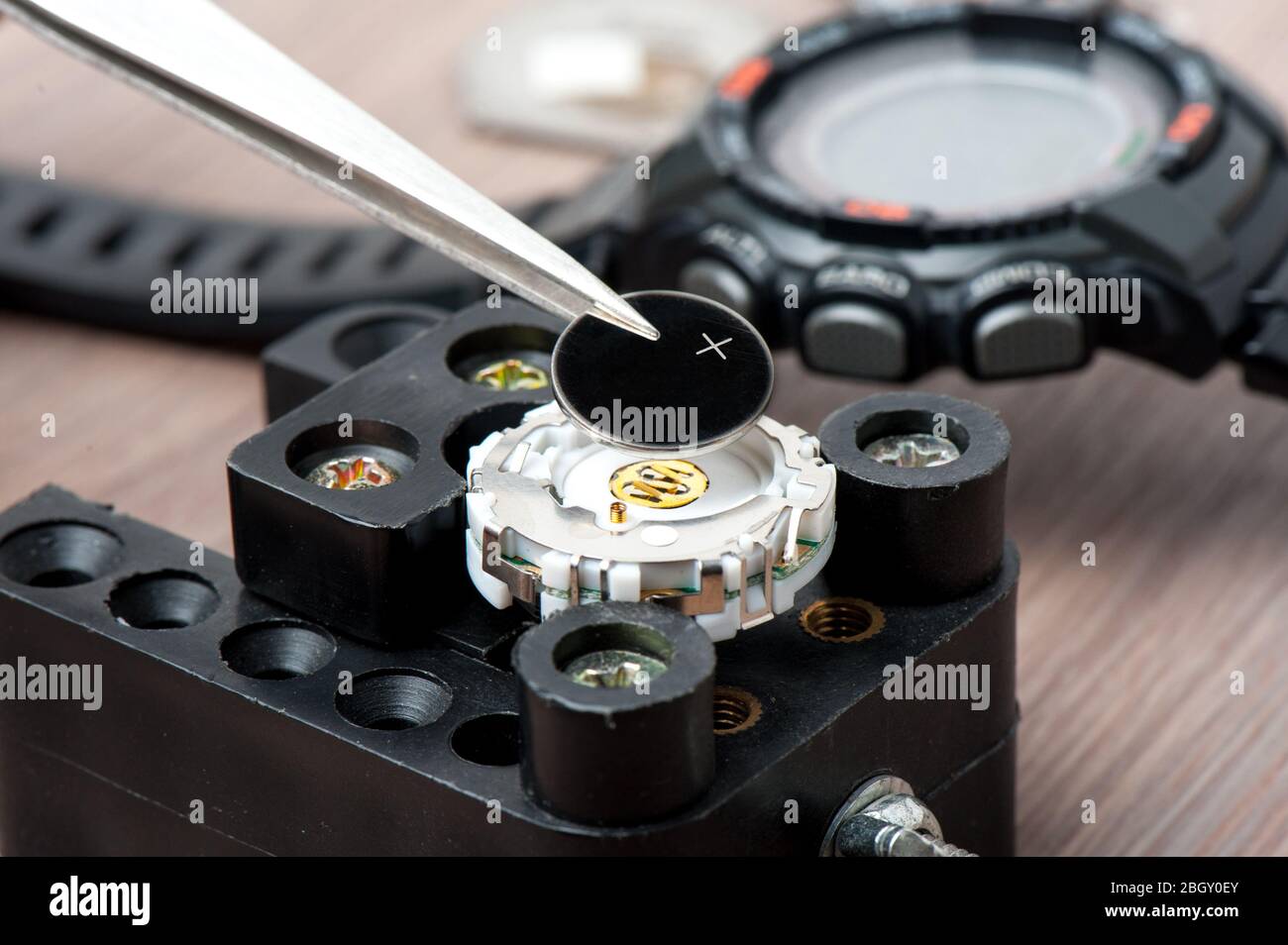 watch battery replacement, watchmaker replacing watch battery on quartz ...