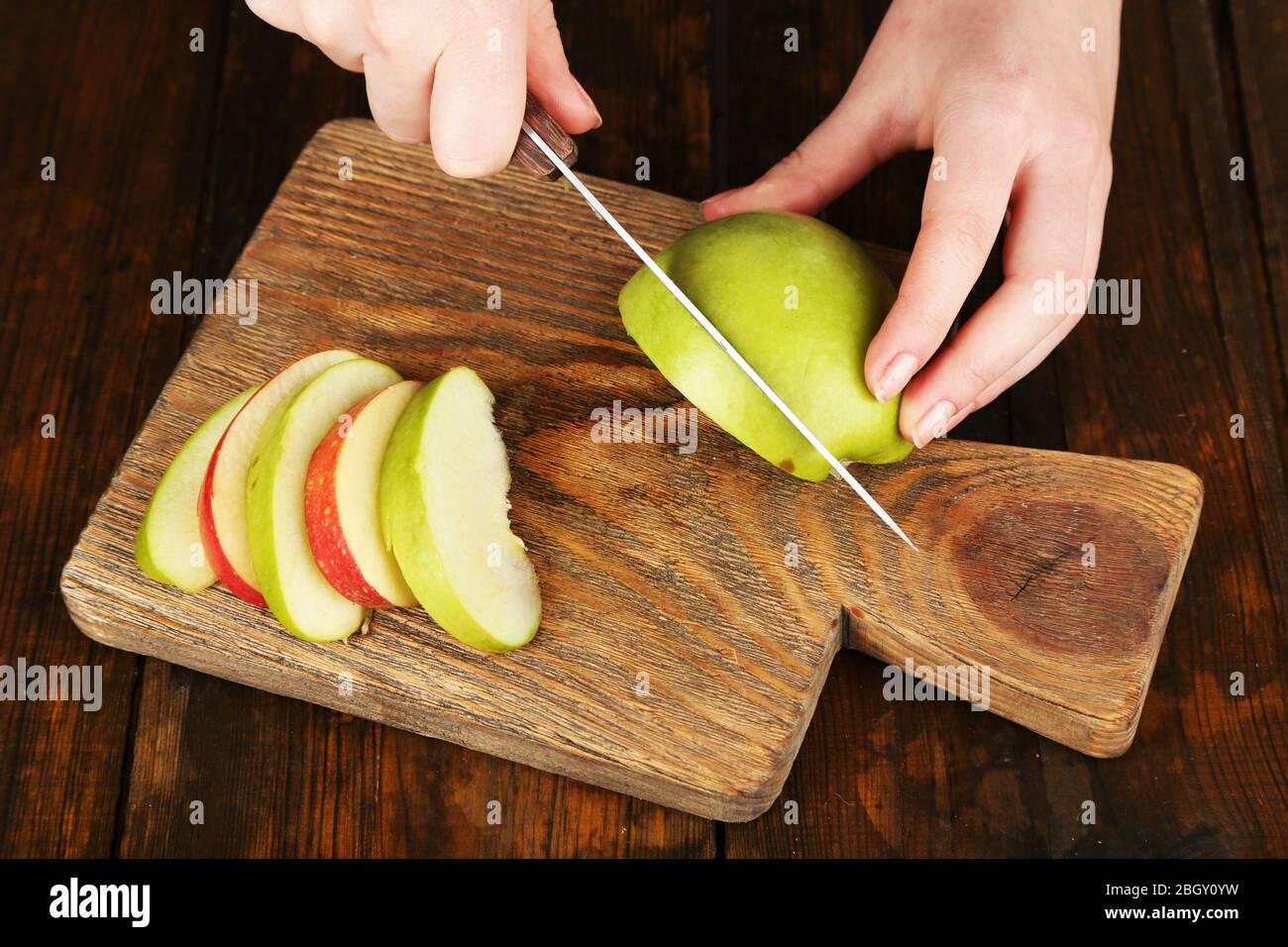 Closeup hands cutting apple large hi-res stock photography and images ...
