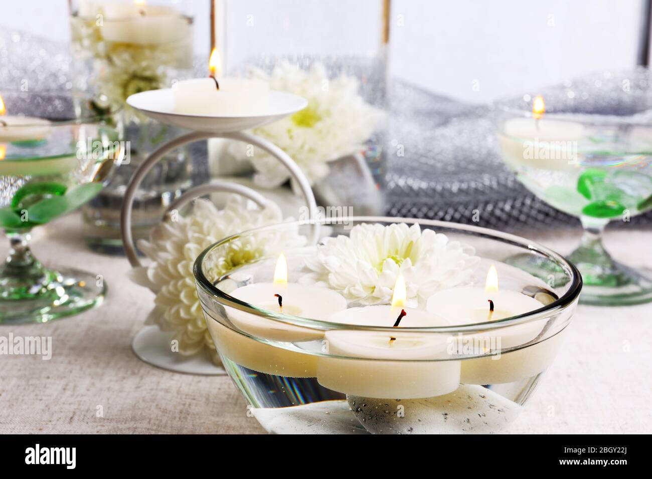 Floating candles in water Stock Photo - Alamy