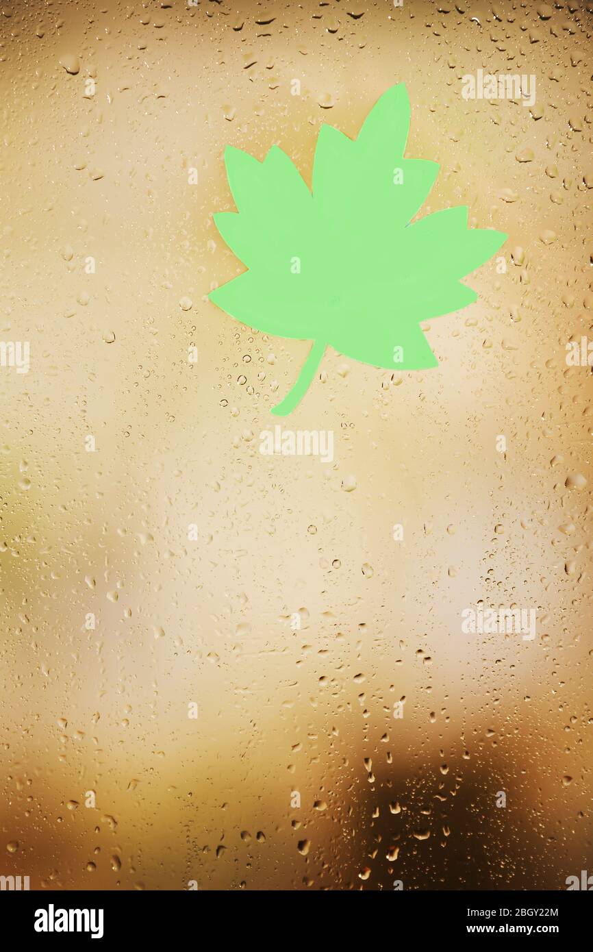 Sticker on wet window Stock Photo - Alamy
