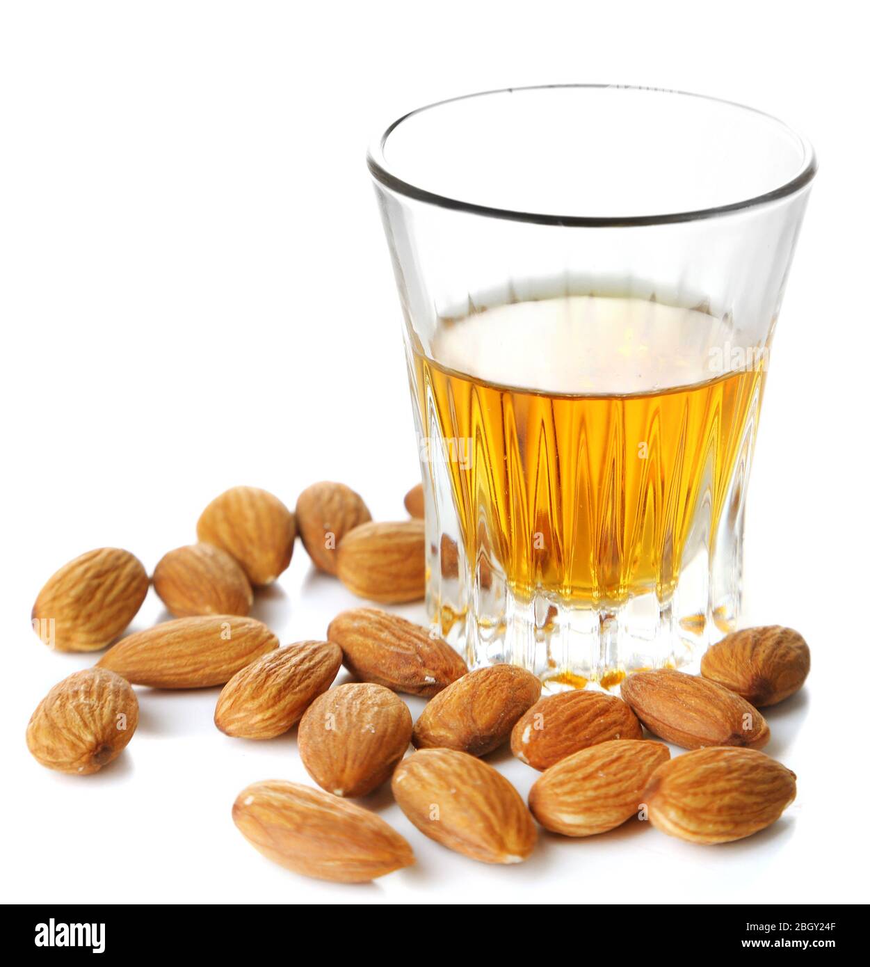 Dessert liqueur Amaretto with almond nuts, isolated on white Stock ...