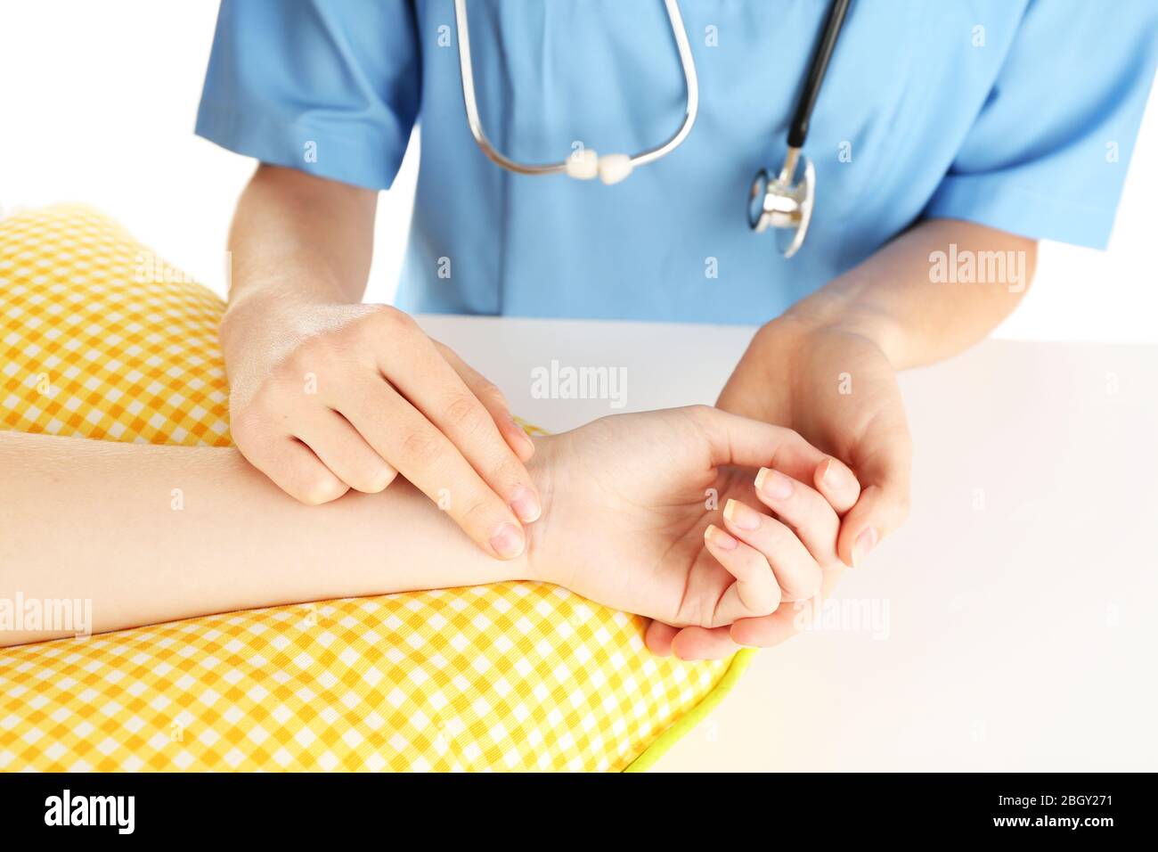 Checking pulse by hand on white background Stock Photo - Alamy