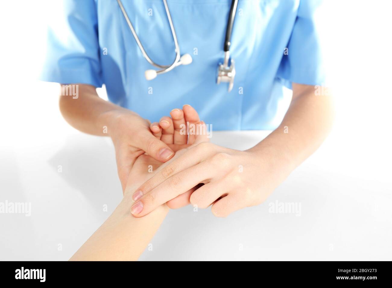 Checking pulse by hand on white background Stock Photo - Alamy