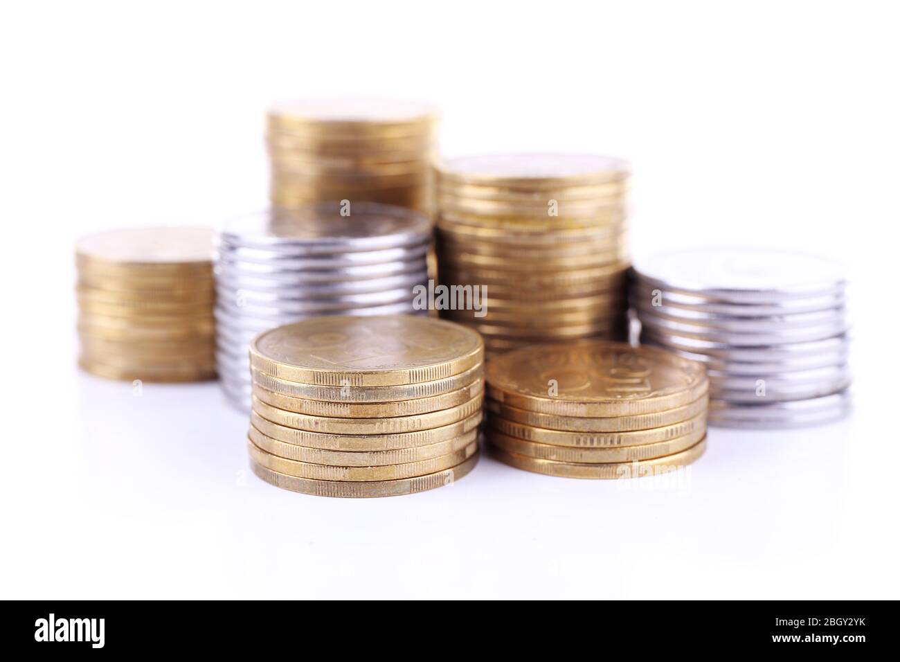 Pile of coins isolated on white background Stock Photo - Alamy