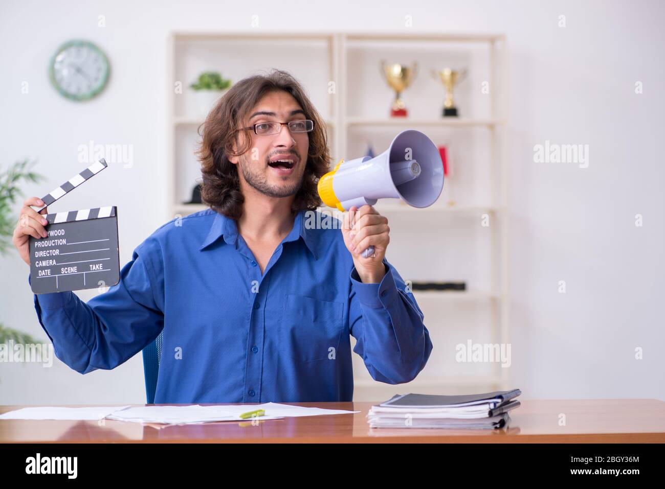 Movie director working in studio Stock Photo - Alamy