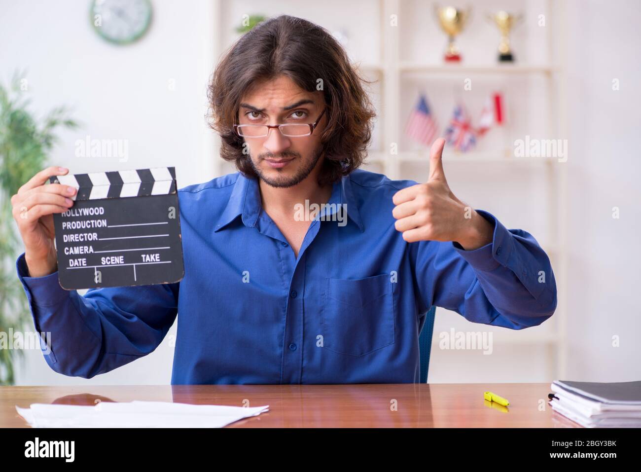 Movie director working in studio Stock Photo - Alamy