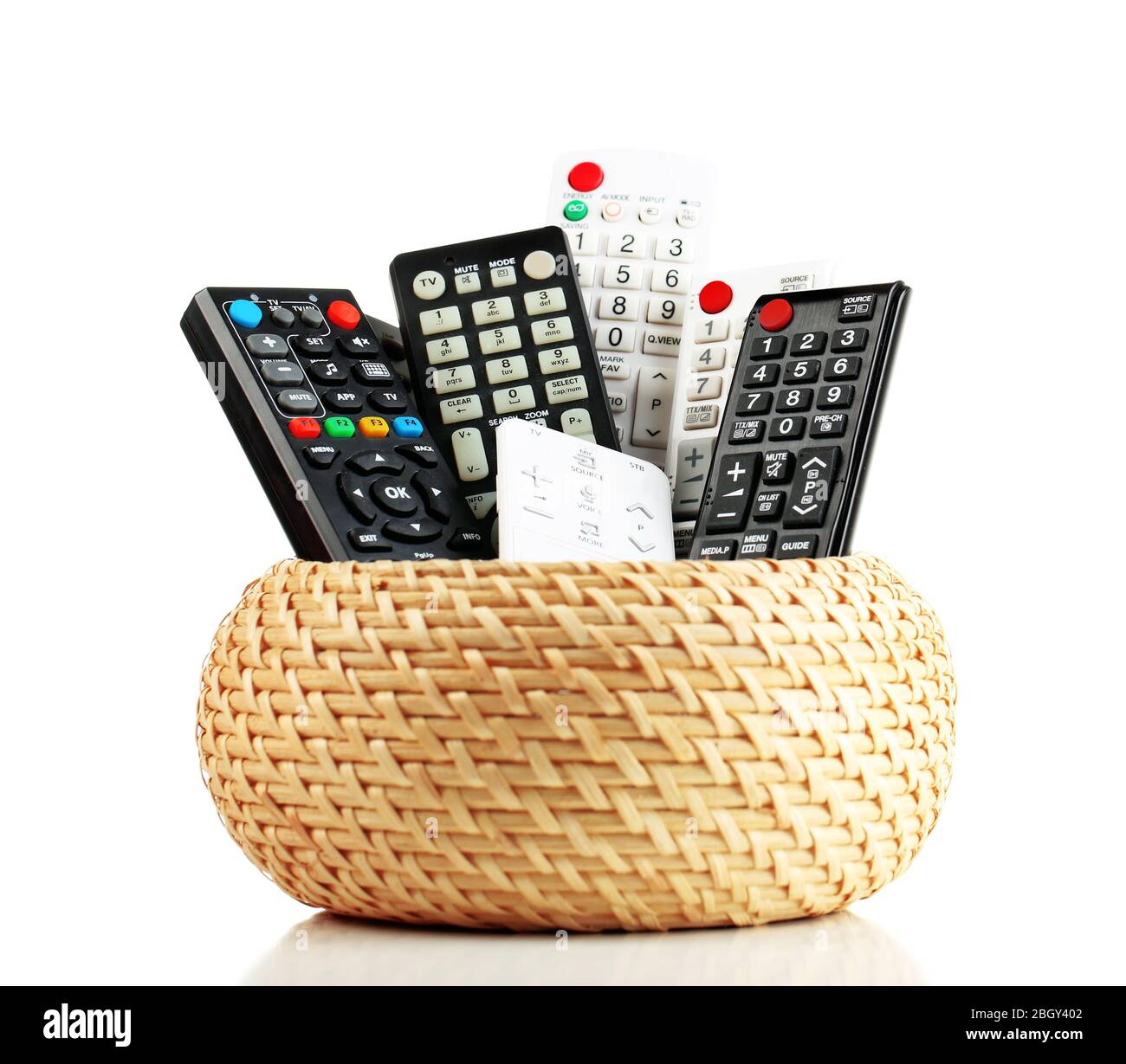 Many remote control devices in container isolated on white Stock Photo ...