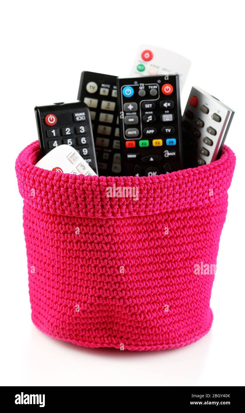 Many remote control devices in container isolated on white Stock Photo ...