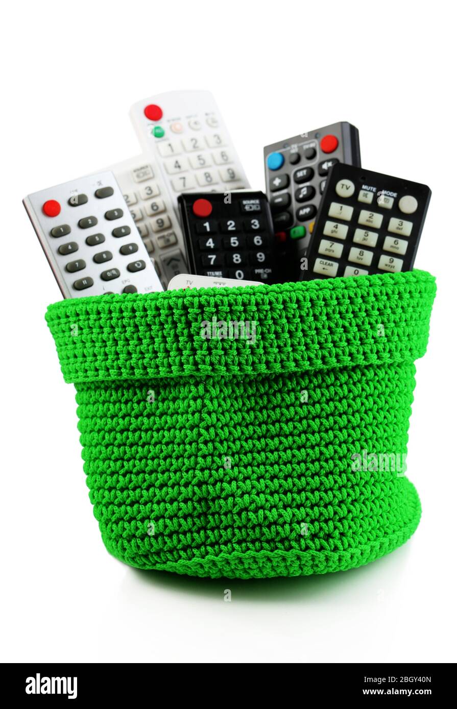 Many remote control devices in container isolated on white Stock Photo ...