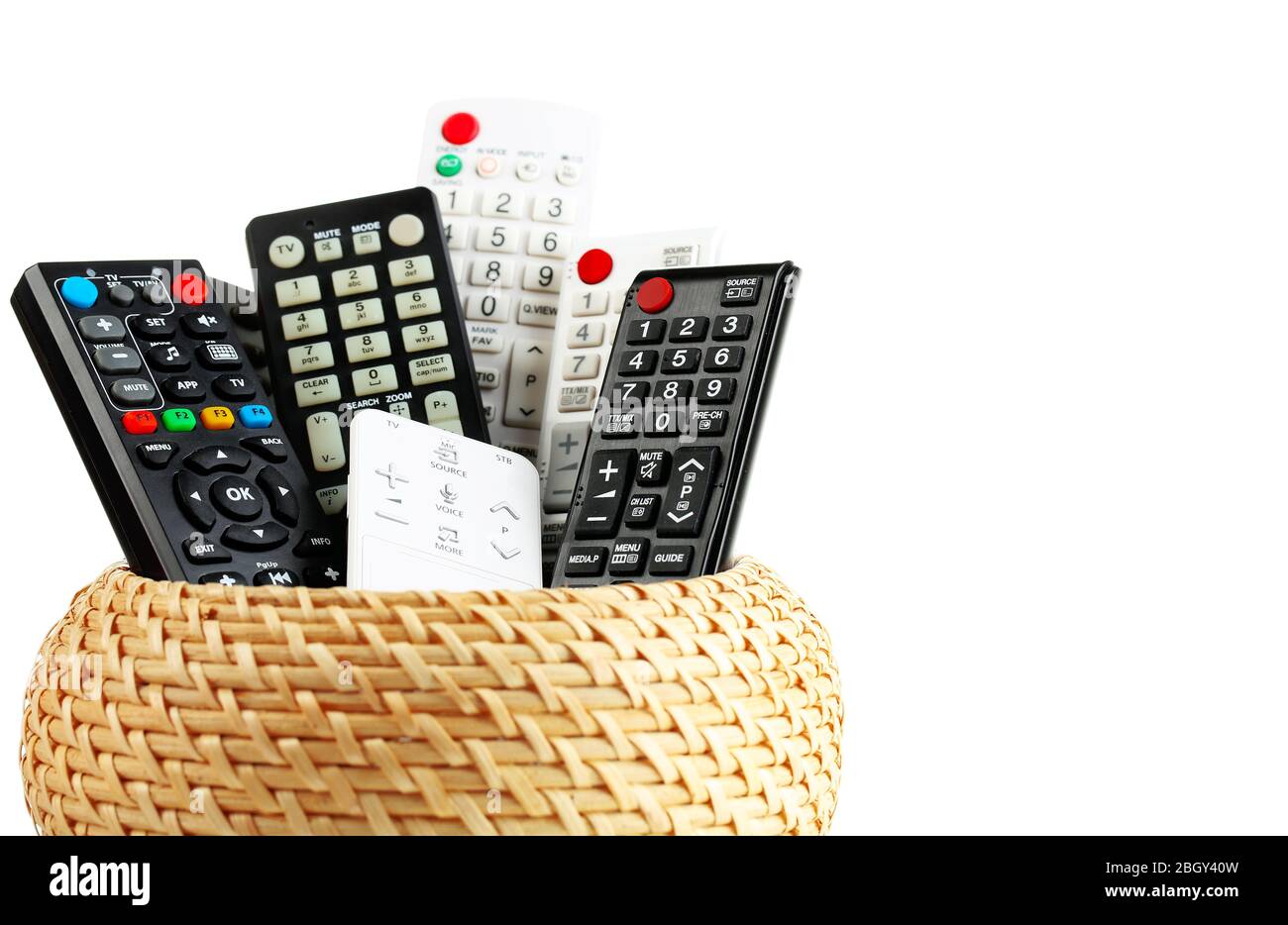 Many remote control devices in container isolated on white Stock Photo ...