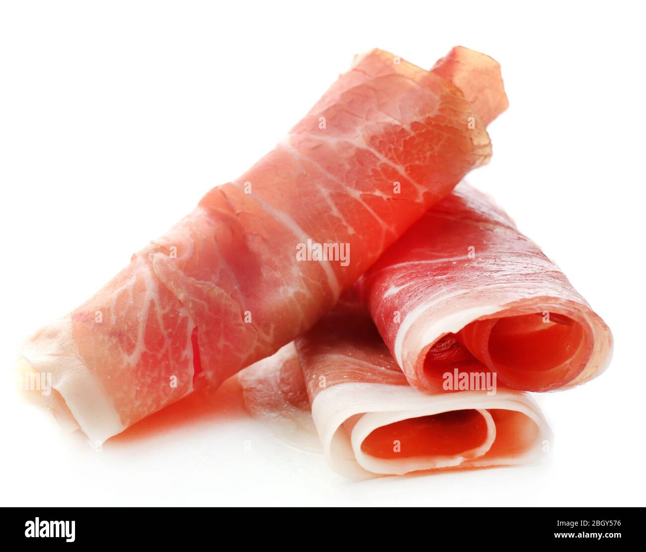 Sliced of jamon isolated on white background Stock Photo - Alamy