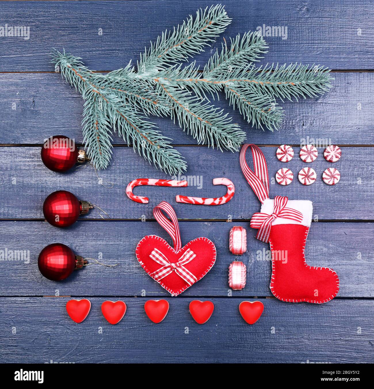 Collection of Christmas objects on color wooden background Stock Photo ...