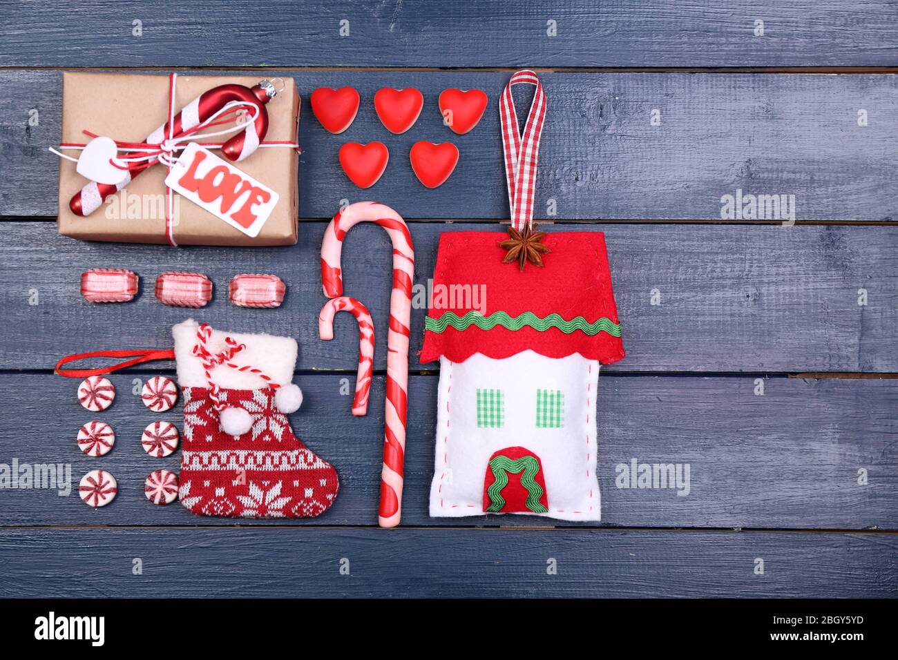 Collection of Christmas objects on color wooden background Stock Photo ...