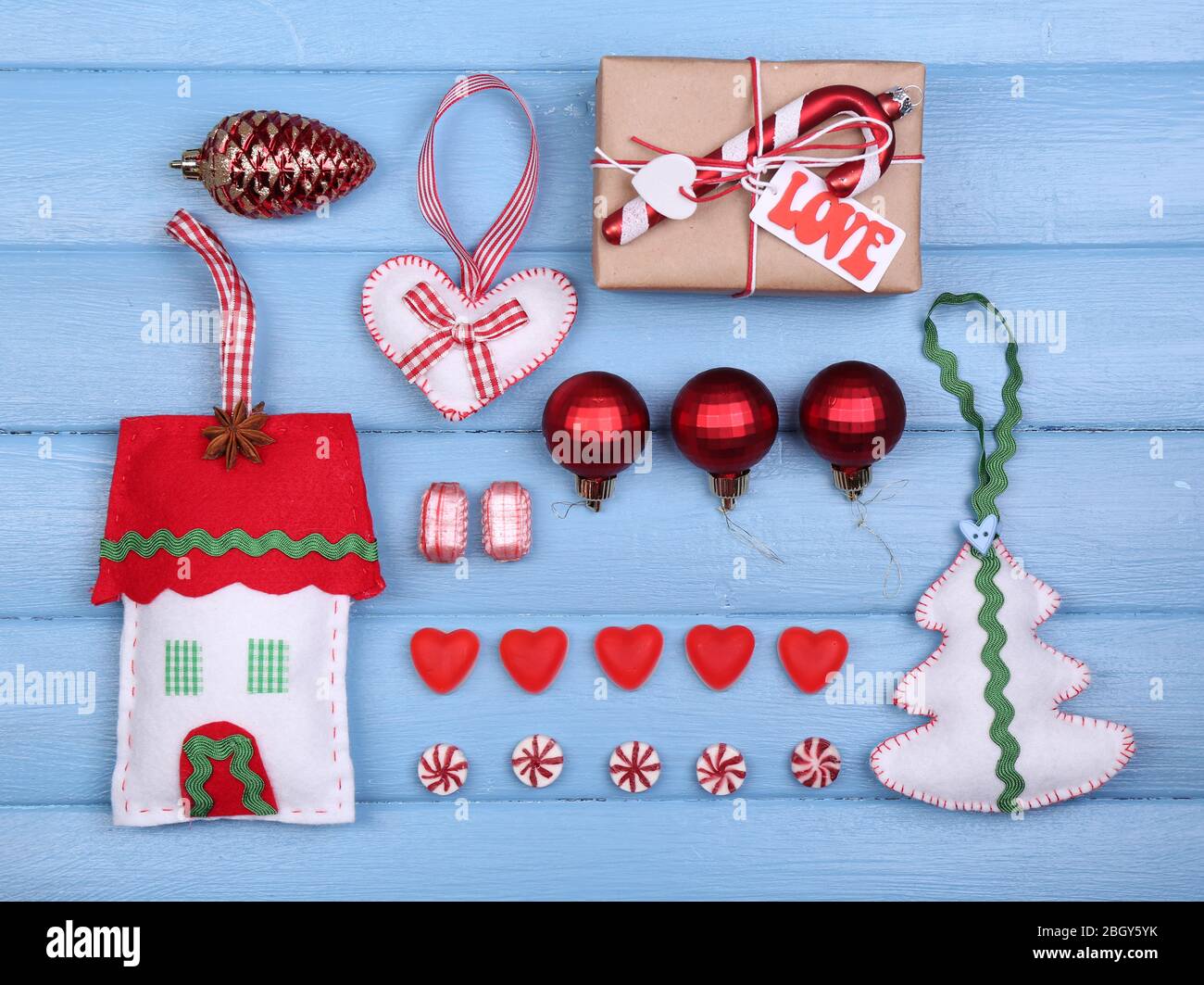 Collection of Christmas objects on color wooden background Stock Photo ...