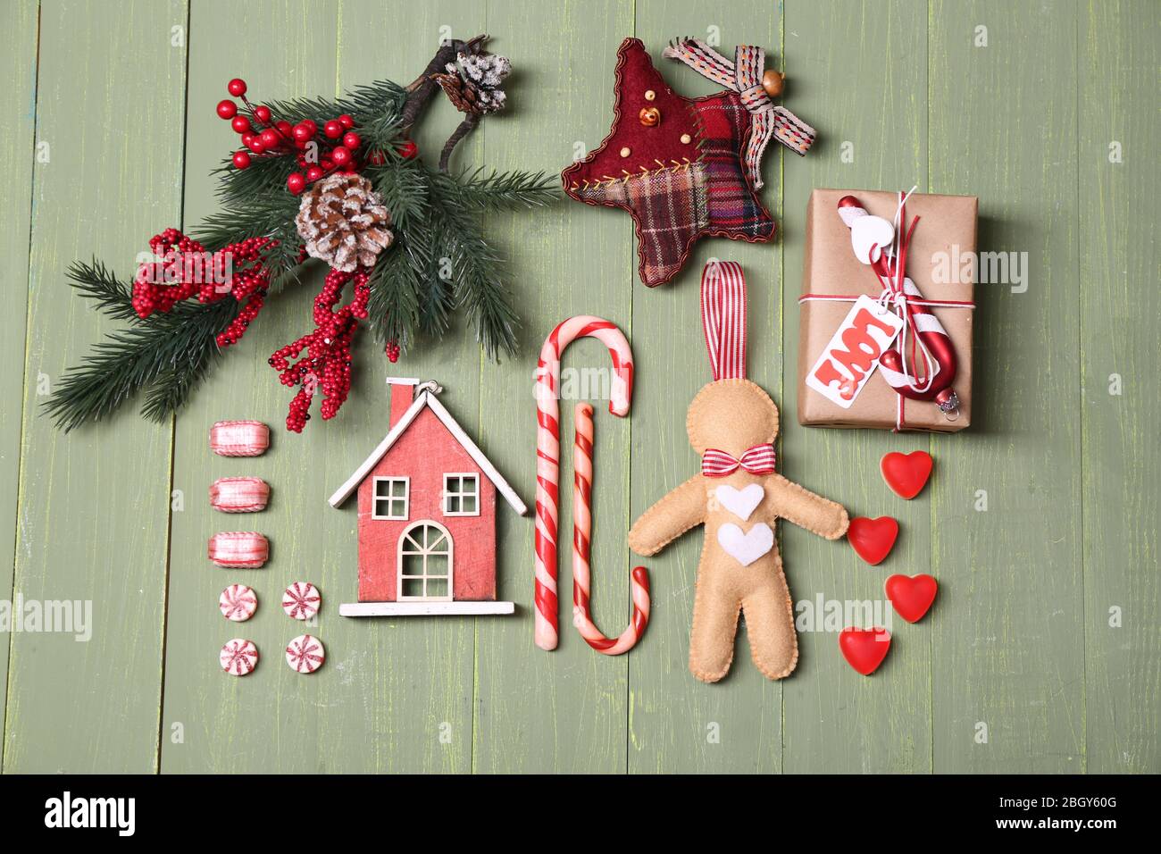 Collection of Christmas objects on color wooden background Stock Photo ...