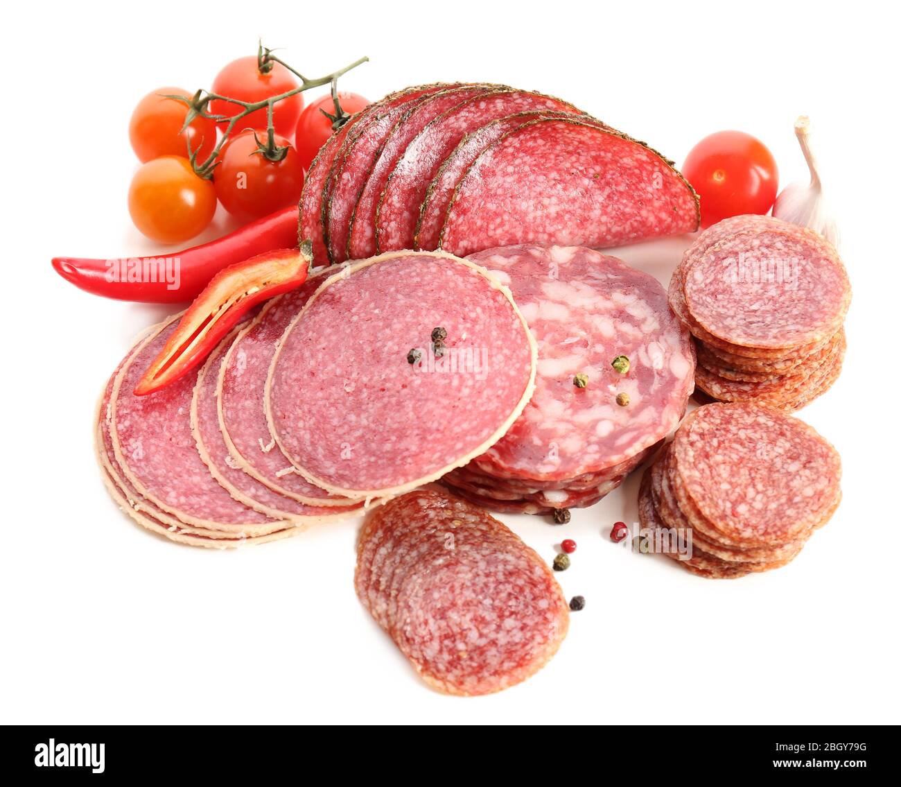 Various sliced salami with chili pepper, cherry tomatoes and spices ...