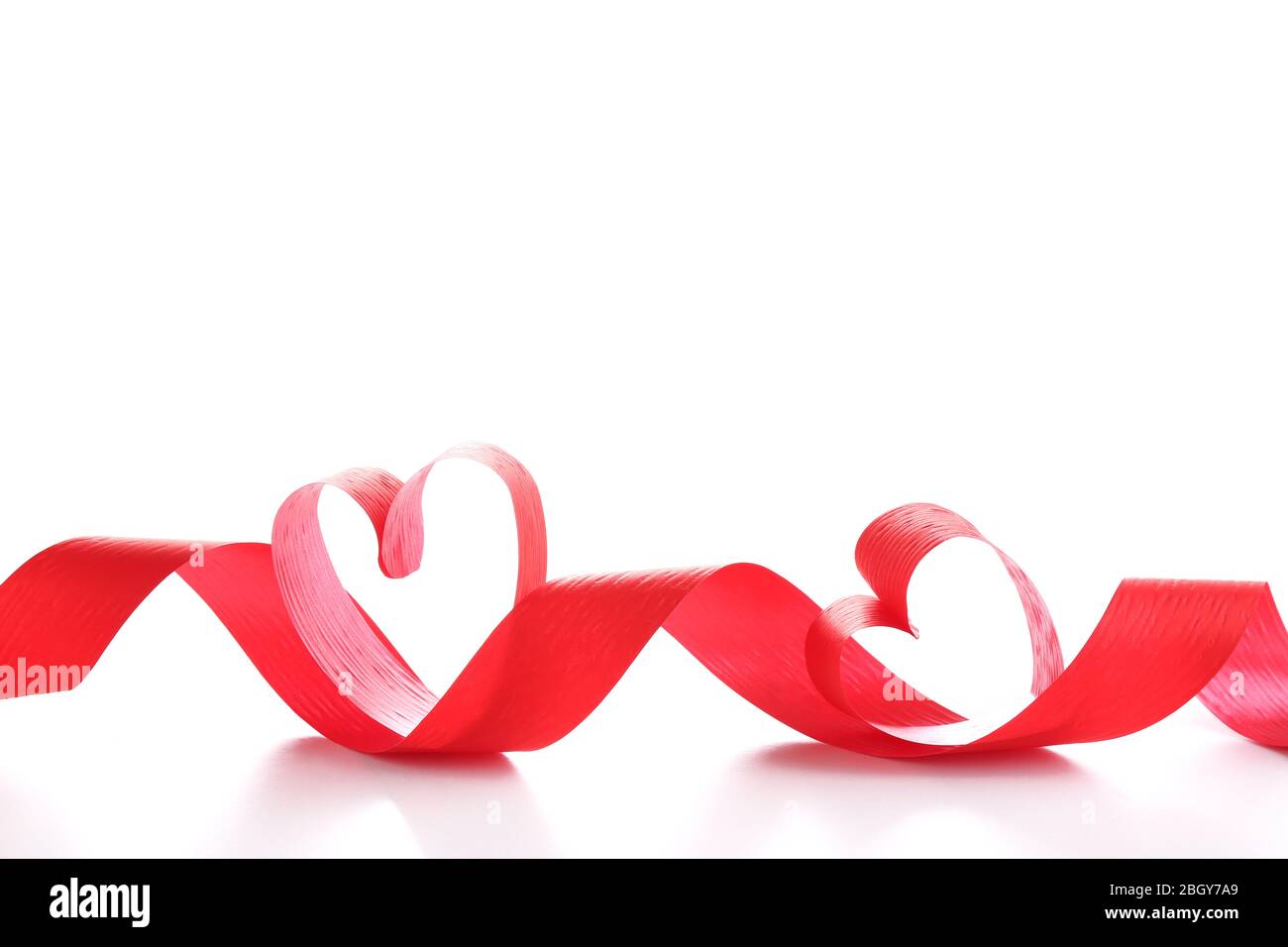 Ribbon shaped as hearts isolated on white background Stock Photo - Alamy