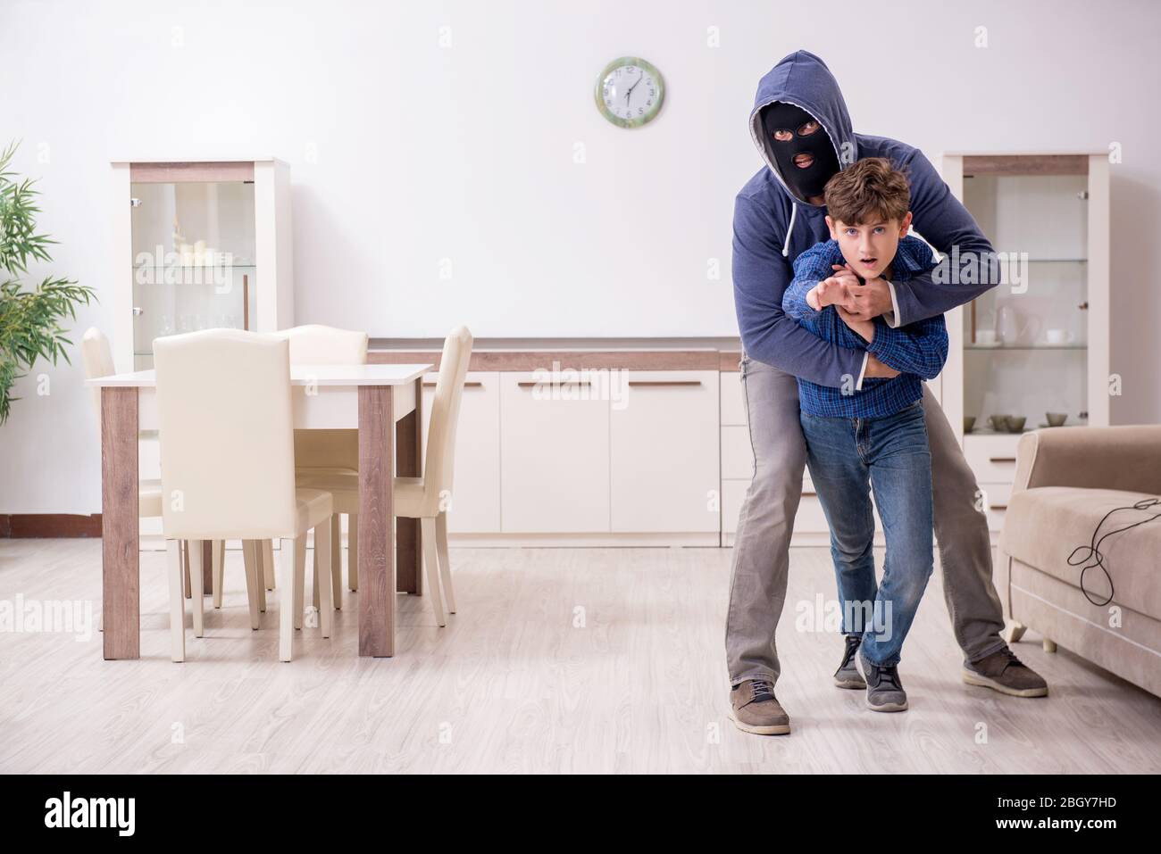 Child abduction concept with the young boy Stock Photo - Alamy