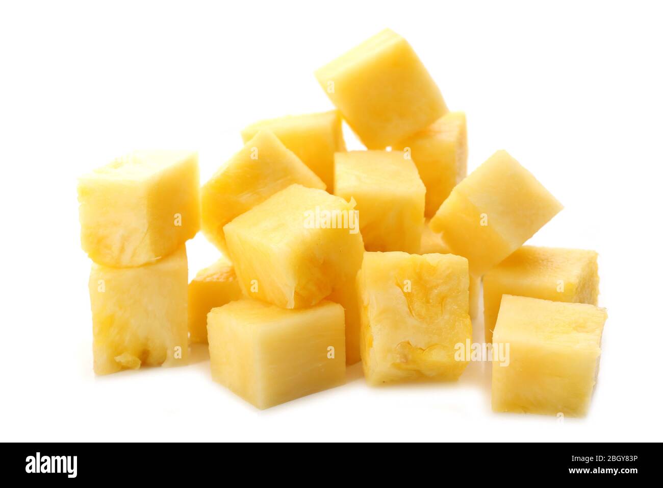 Cubes of canned pineapple isolated on white Stock Photo - Alamy