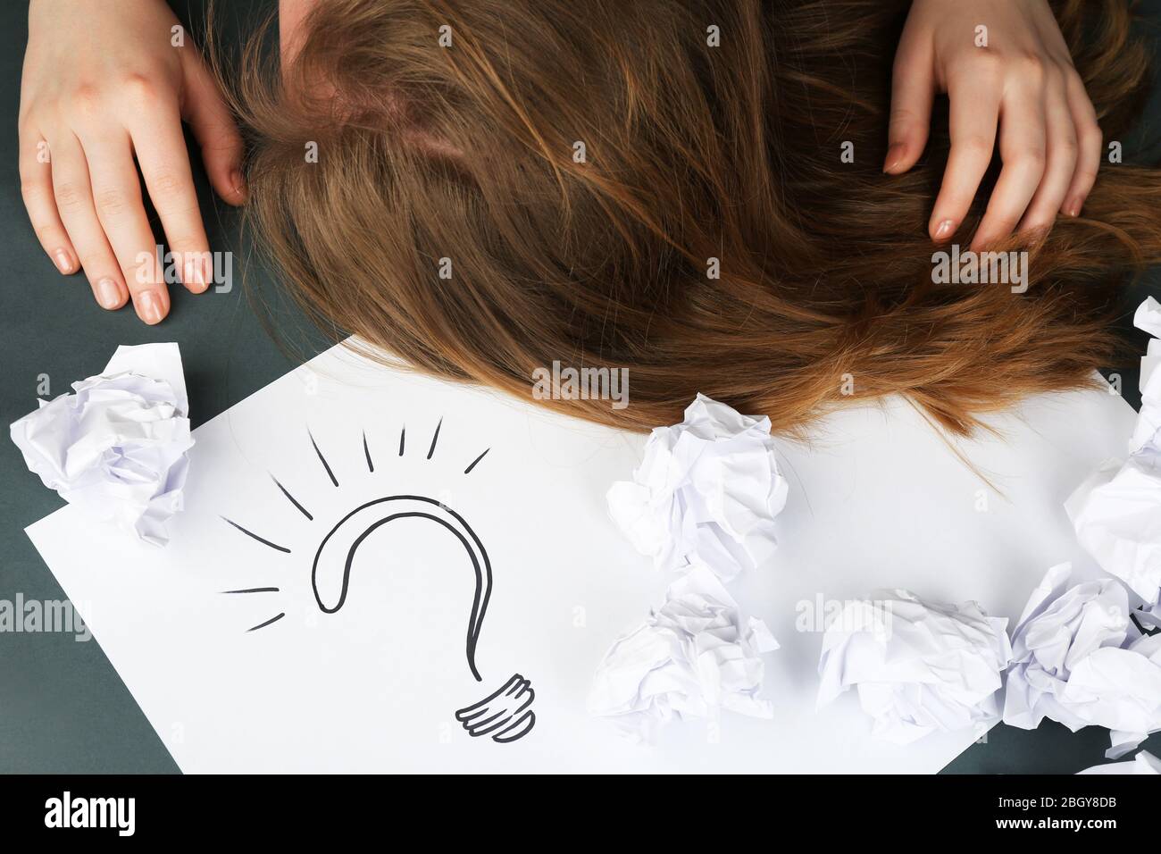 Tired woman at desk with question mark sheet of paper, closeup Stock ...