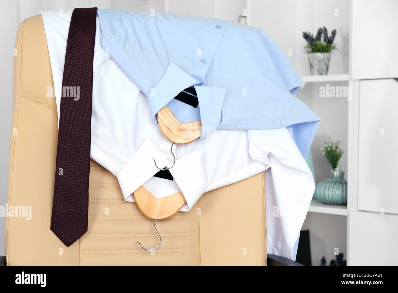 Men's clothes on chair Stock Photo - Alamy