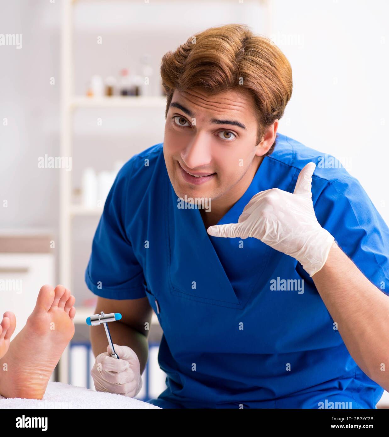 The podiatrist treating feet during procedure Stock Photo - Alamy