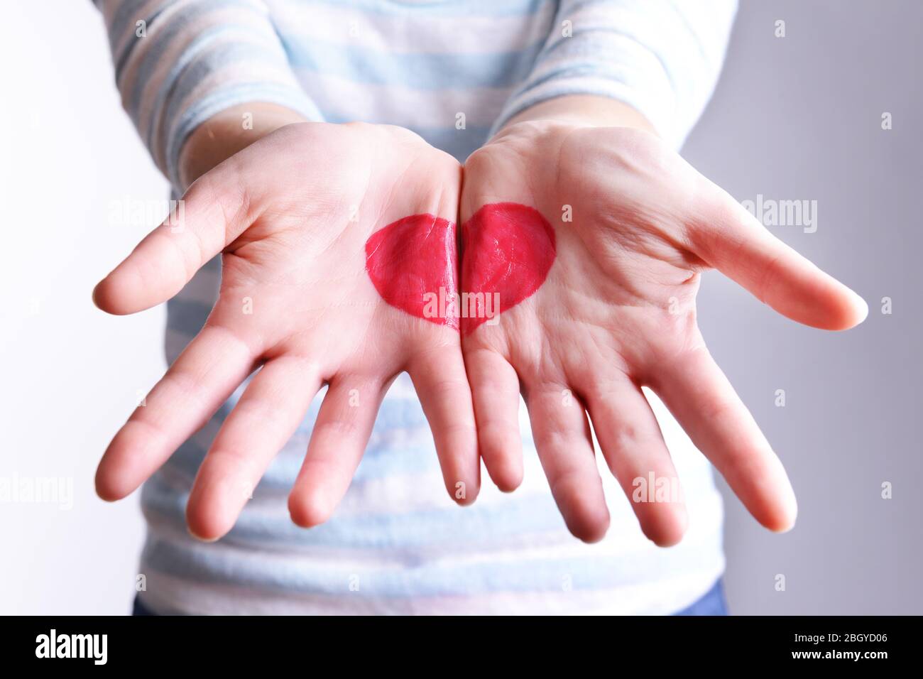 Drawing hart on female hands close-up Stock Photo - Alamy
