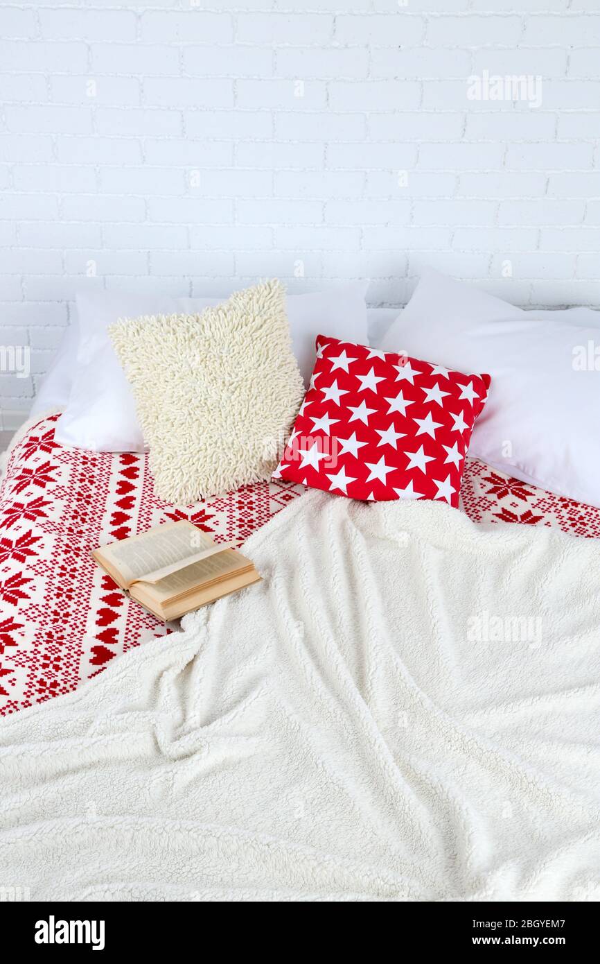 Book on bed close-up Stock Photo - Alamy