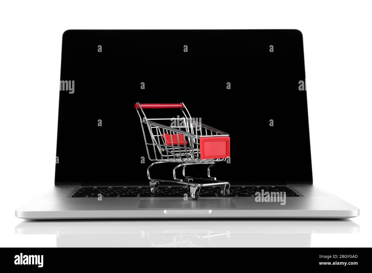 Laptop with small shopping cart isolated on white background Stock ...