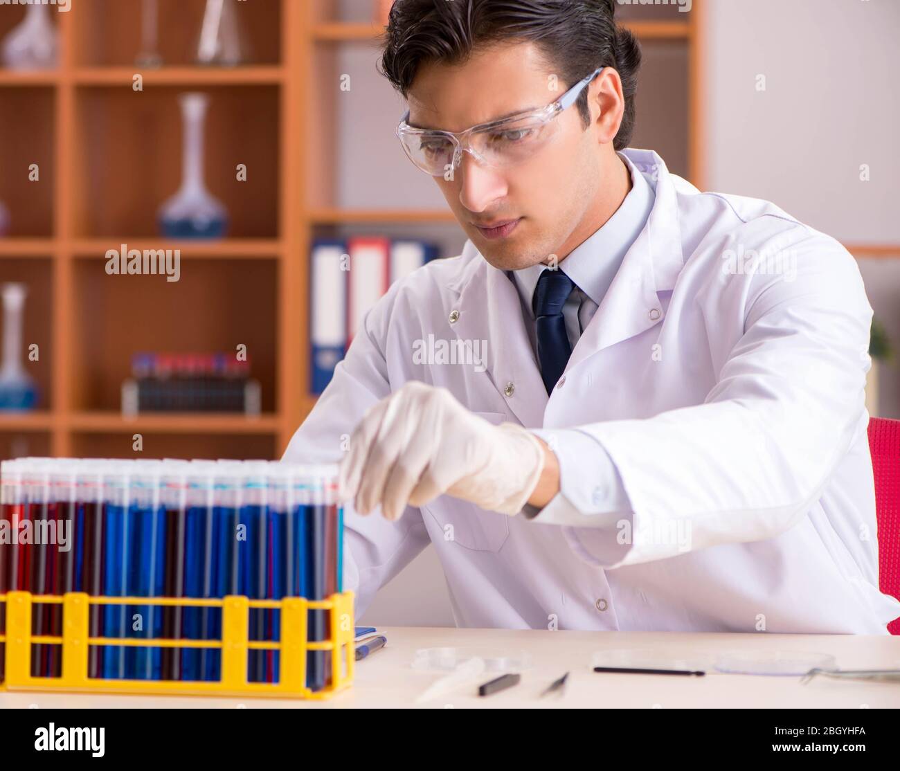 The young biochemist working in the lab Stock Photo - Alamy