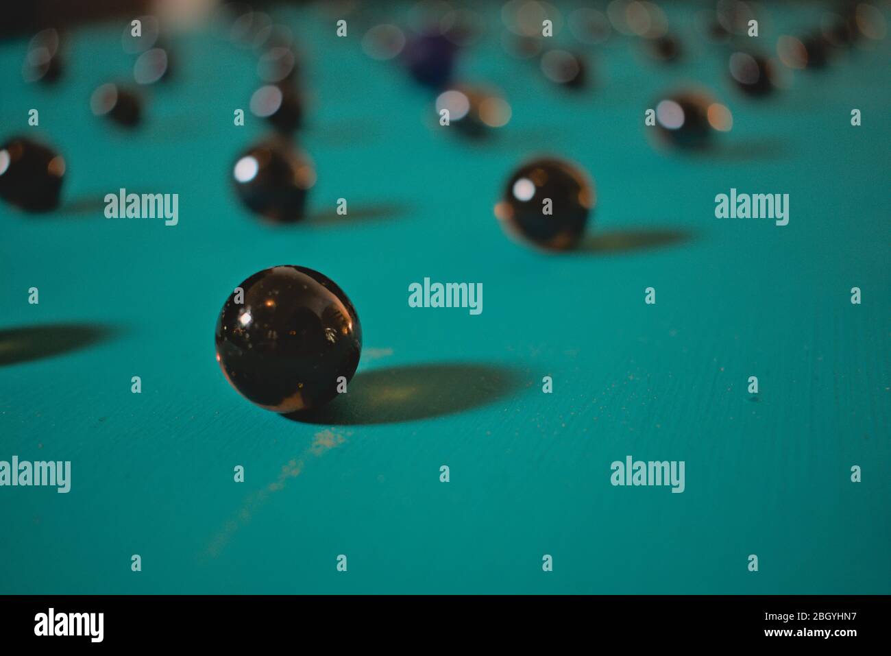 row of marbles Stock Photo - Alamy