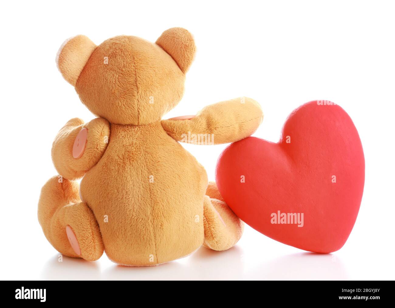 Teddy Bear with red heart isolated on white Stock Photo - Alamy