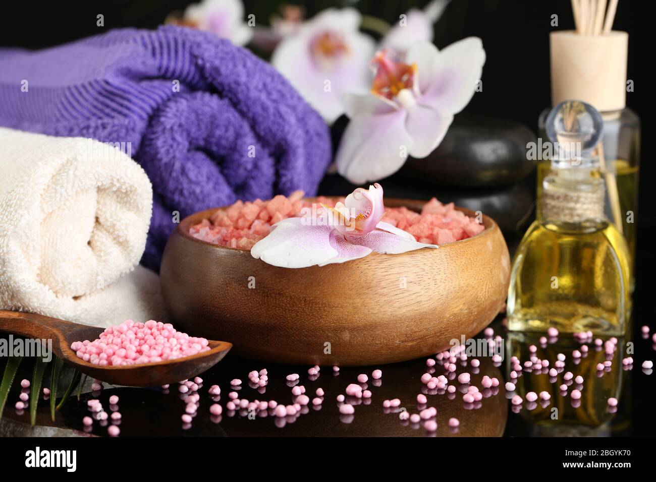 Beautiful spa composition with flowers on dark background Stock Photo ...