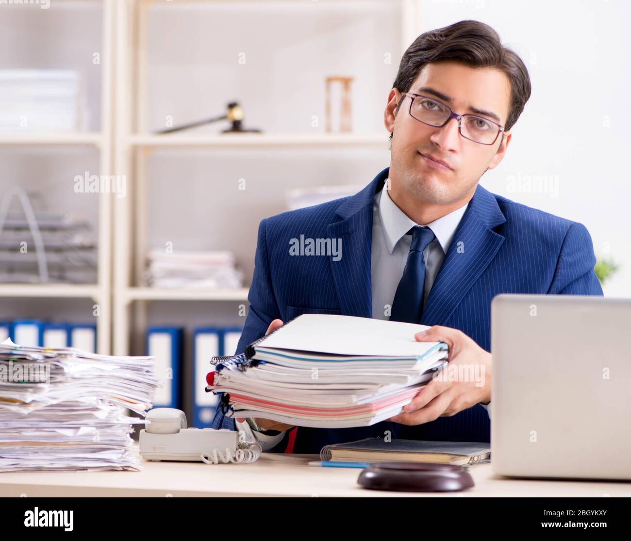 The busy man complaining about his workload Stock Photo - Alamy