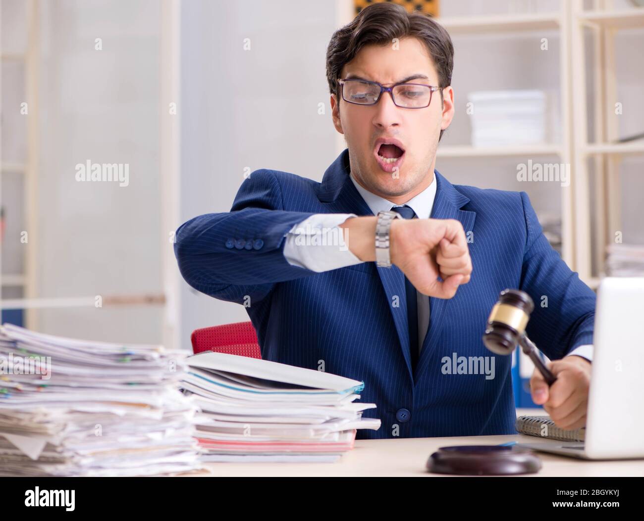 The young handsome judge working in court Stock Photo - Alamy