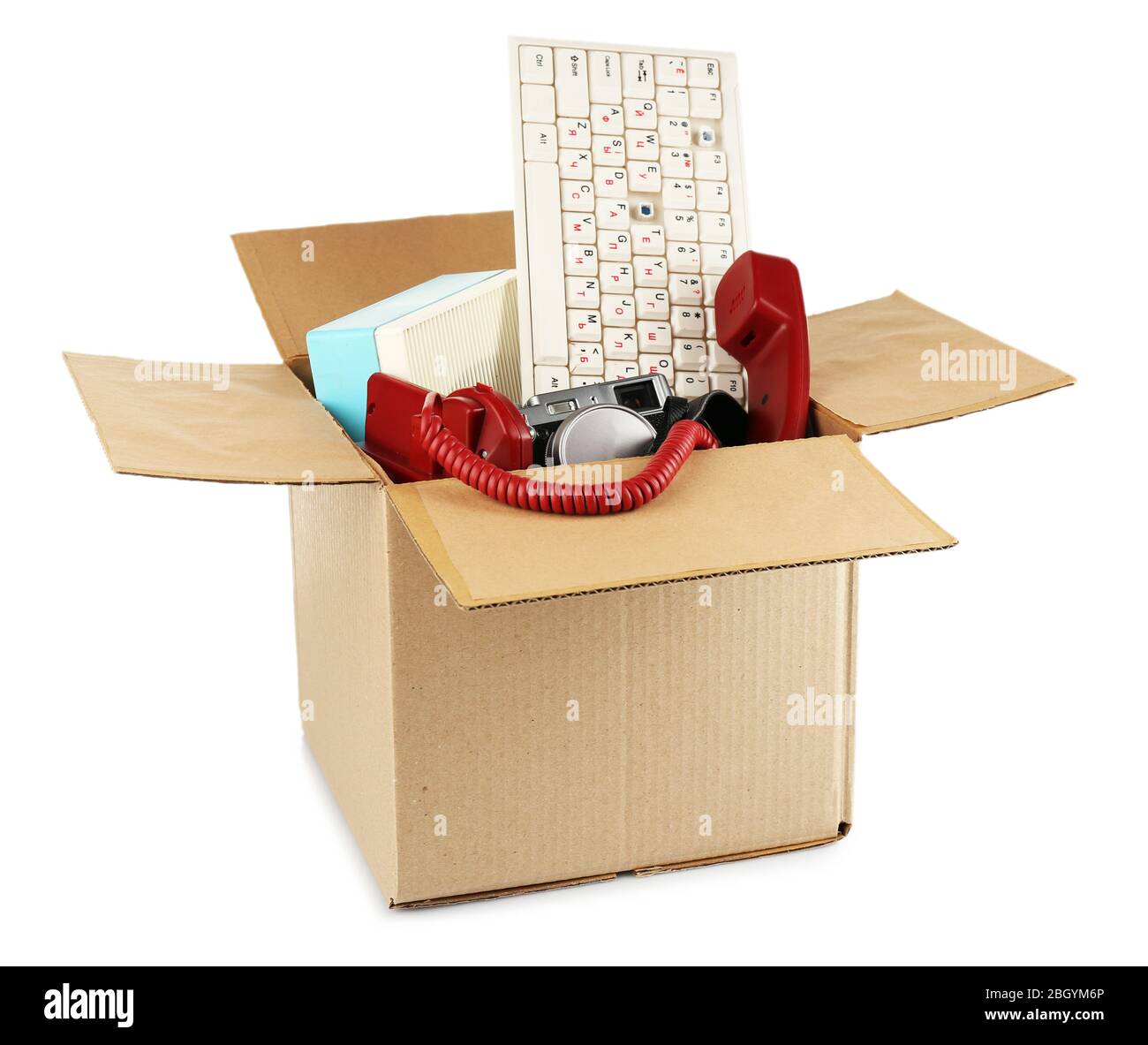 Box of unwanted stuff isolated on white Stock Photo - Alamy