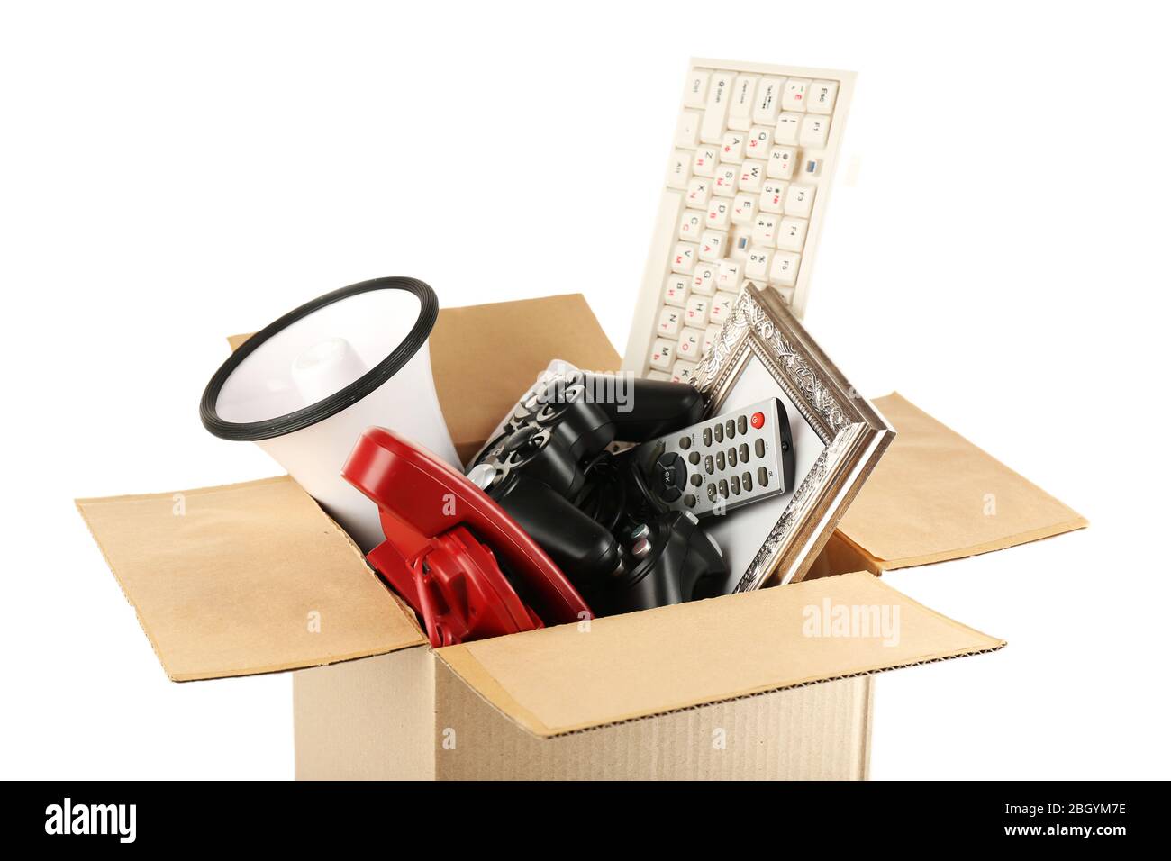 Box of unwanted stuff isolated on white Stock Photo - Alamy