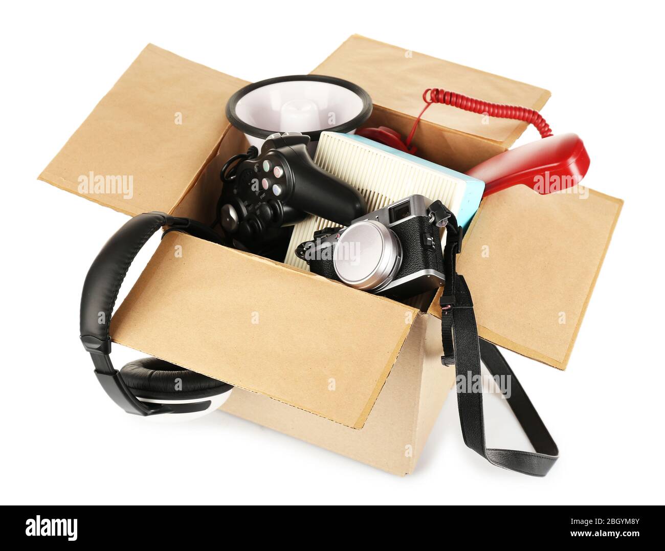 Box of unwanted stuff isolated on white Stock Photo - Alamy