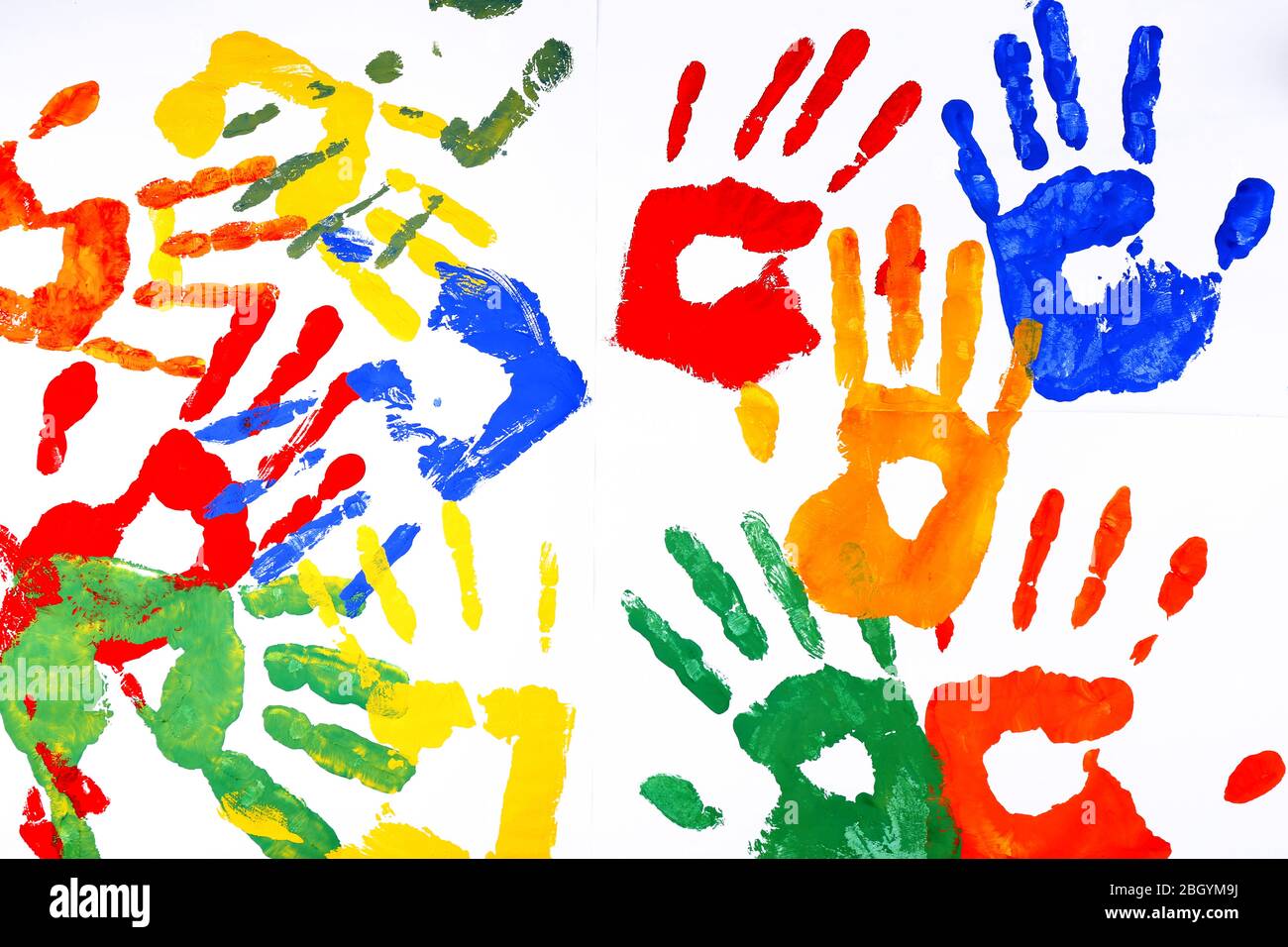 Hand prints of paint on white background Stock Photo - Alamy