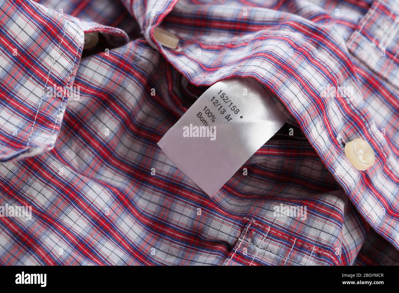 Label on clothing close-up Stock Photo - Alamy