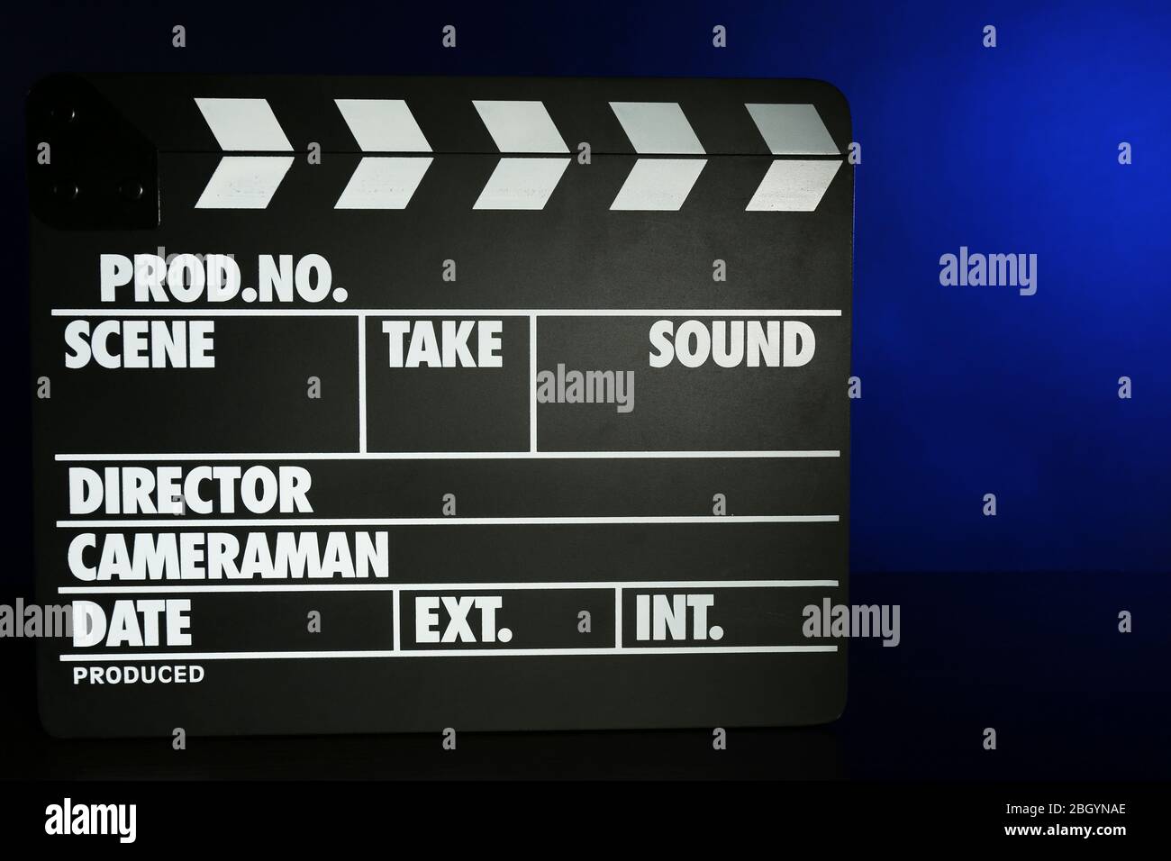 Movie clapper on dark color background Stock Photo - Alamy